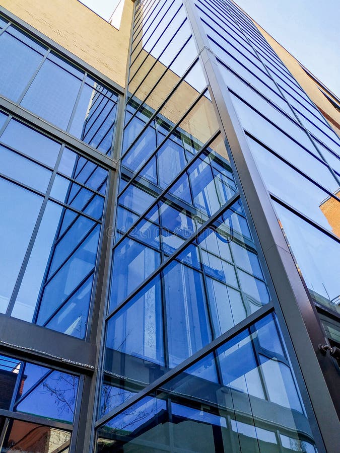 Bottom View on Modern Building with Glass Windows Stock Photo - Image ...