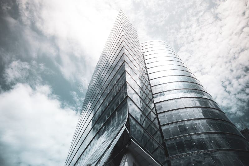 Bottom View of Modern Skyscraper Stock Photo - Image of dusk, light ...