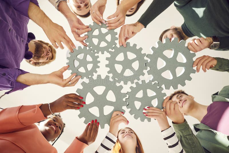 Bottom View of Multinational Team Holding Gears Stock Photo - Image of ...