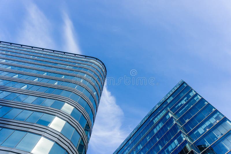 Bottom View of Office Buildings Against Blue Sky. Stock Image - Image ...
