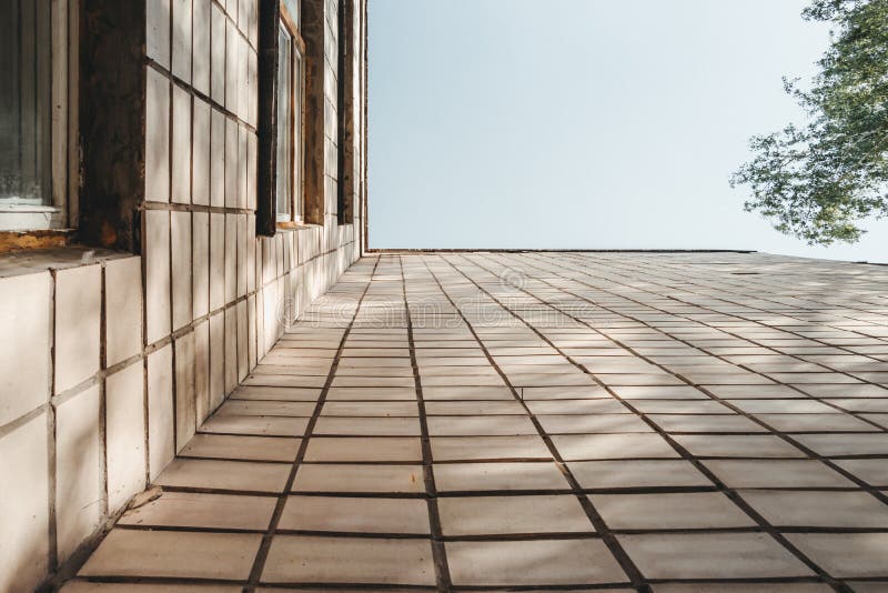 Bottom View of Old Building from White Tile Stock Photo - Image of grey ...