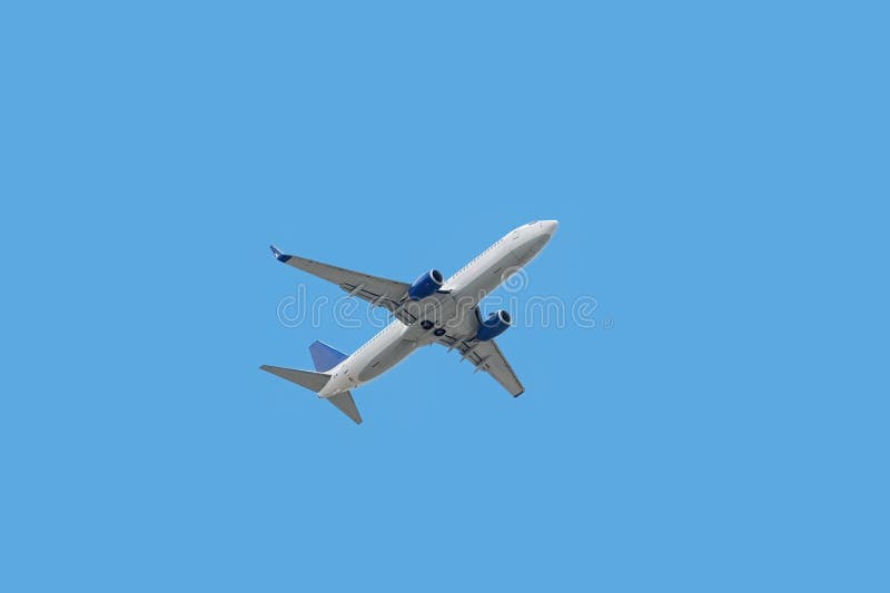 Bottom View of Passenger Plane Taking Off in Blue Sky Stock Image ...