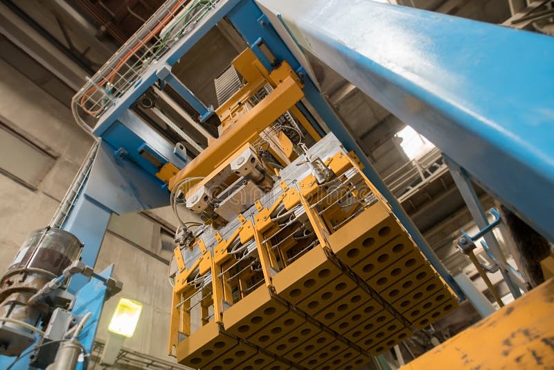 Bottom View of Production Machine with Bricks Stock Photo - Image of ...