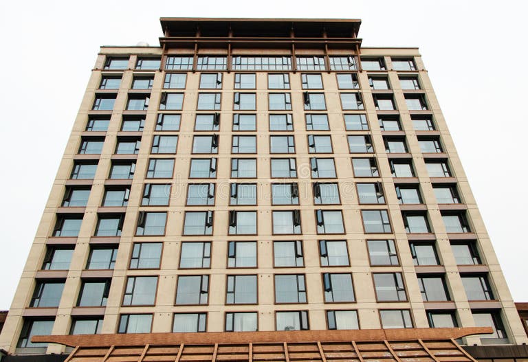 Bottom View of Rectangular High-rise Building Hotel. Blue Sky with ...