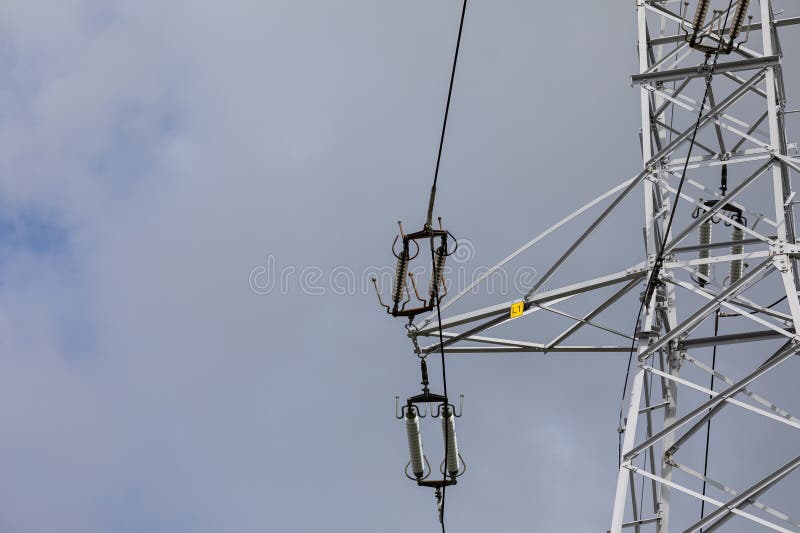 View of Electrical Insulators on a High-voltage Overhead Line Pole ...