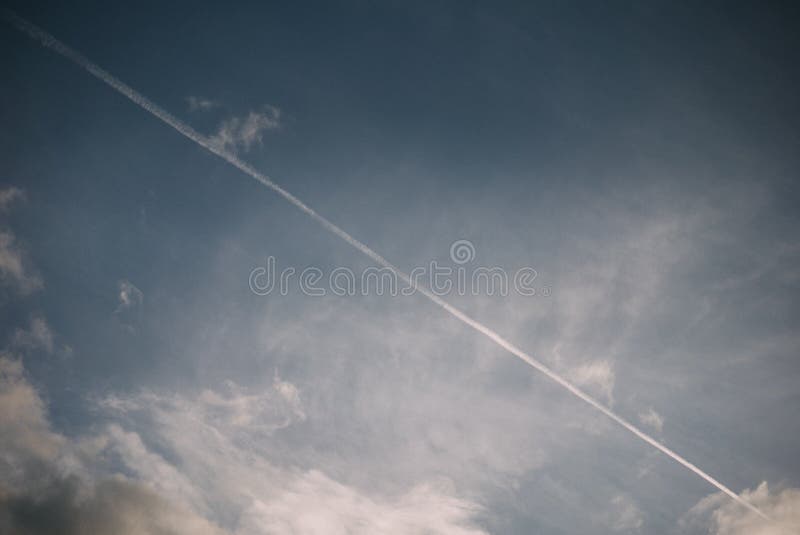 Bottom View Shot of the Race Left by the Plane on the Sky Stock Photo ...