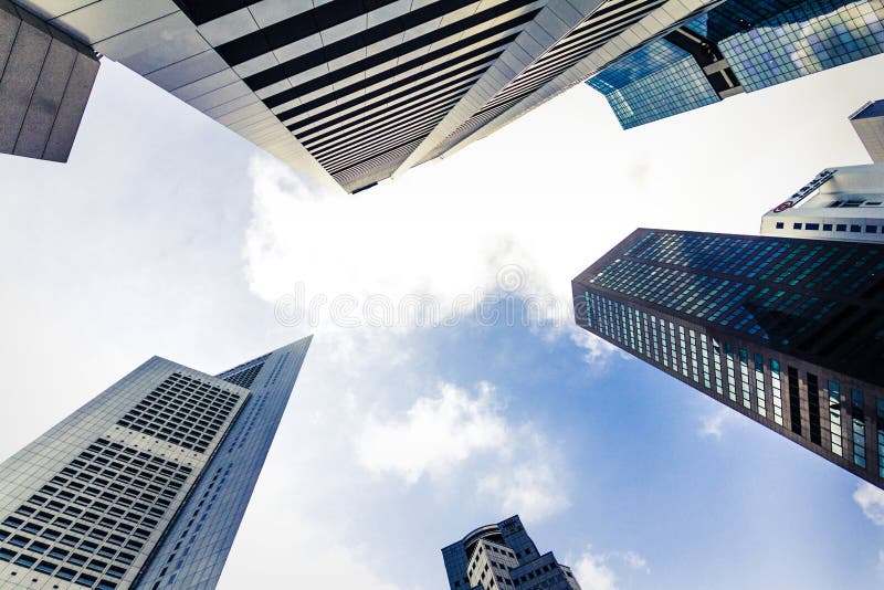 Bottom View of Skyscraper and Blue Sky Background Stock Photo - Image ...