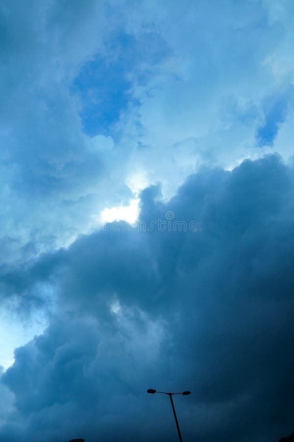 Bottom View of the Dramatic Sky. Clouds Covering the Sun with Sunlight ...