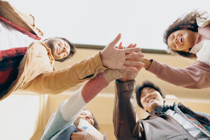 Bottom View of Students Putting Hands Together Standing Near Campus ...