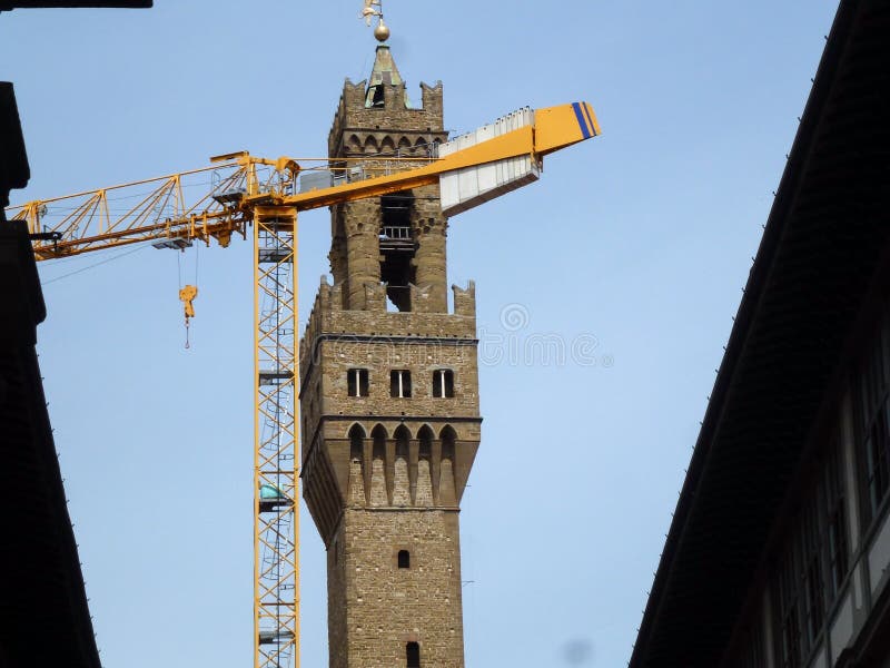 Bottom View of Tall Tower Crane and Ancient Tower. an Example of ...