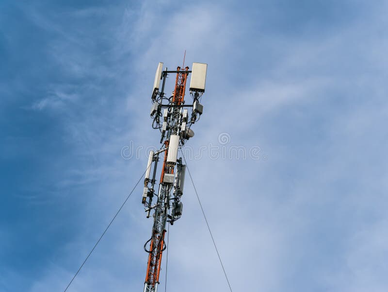 Bottom View of the Top of a Tall Mast with Mobile Cellular Antennas ...