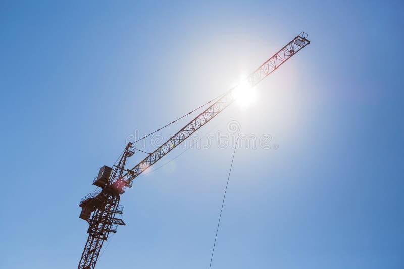Bottom View Tower Crane Rises Against Background of Bright Sun and ...