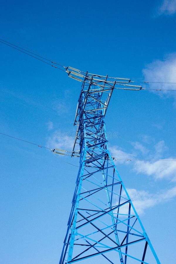 Bottom View of the Tower of Power Grids on Blue Sky Background, High ...