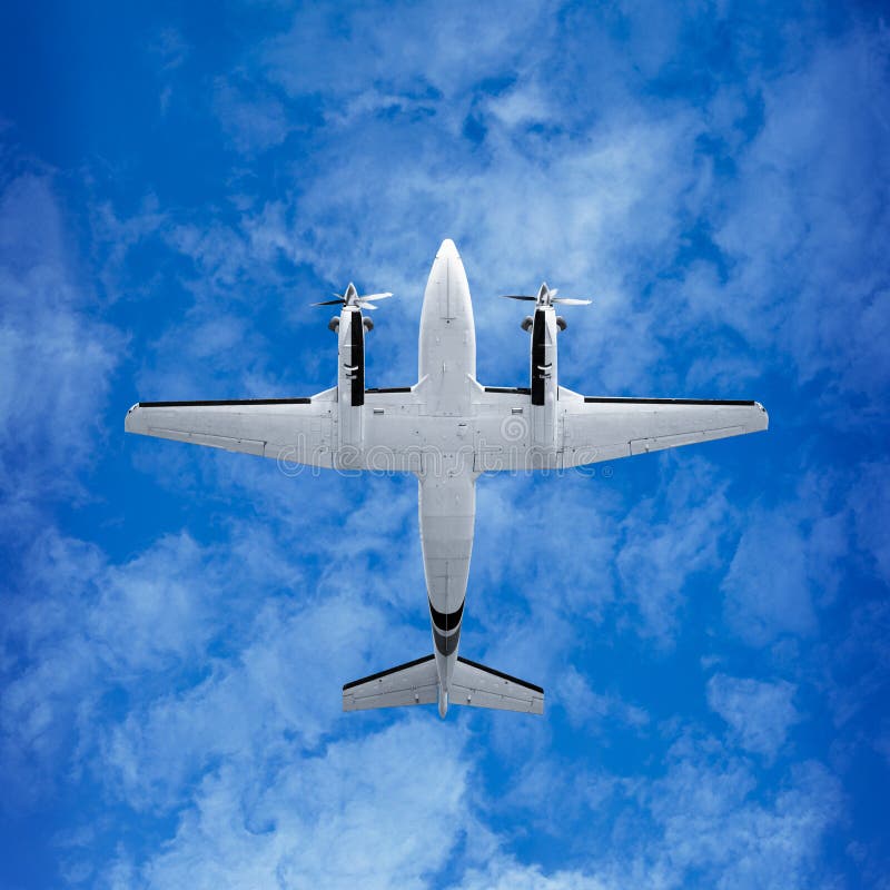 Bottom View - Twin Prop Airplane On Sky Background Stock Photo - Image ...