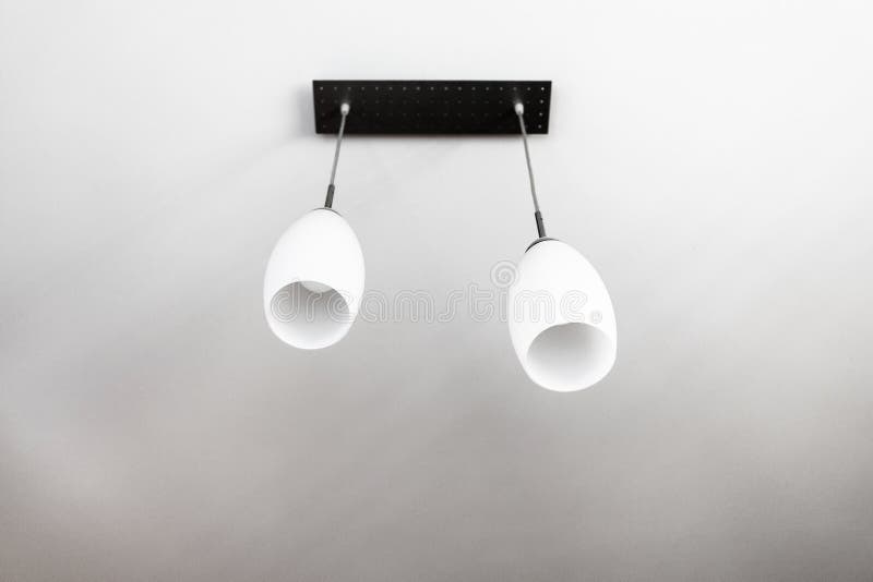Bottom View of Two Frosted Ceiling Lamp Shades Stock Image - Image of ...