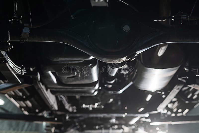 Bottom View of the Underbody of a Car on a Lift. Stock Photo - Image of ...