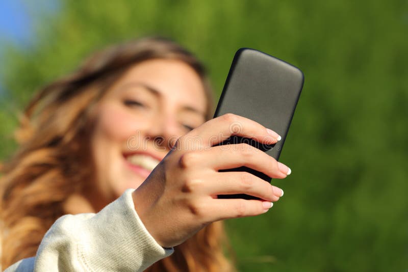 Bottom View of a Woman Hand Texting on a Smart Phone Stock Image ...
