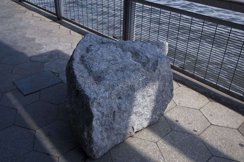 Boulder on Pedestrian Pathway Along a River Stock Image - Image of ...