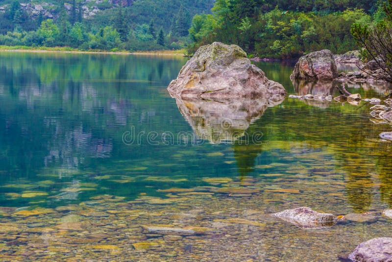 Boulder Reflected in the Pond. Stock Photo - Image of boulder, tatras ...