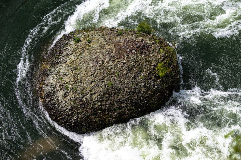 Boulder in the River stock image. Image of shore, flowing - 250106607