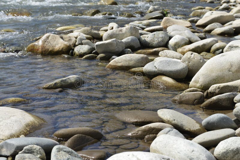 Boulders in the river stock image. Image of beach, pebbles - 45673337