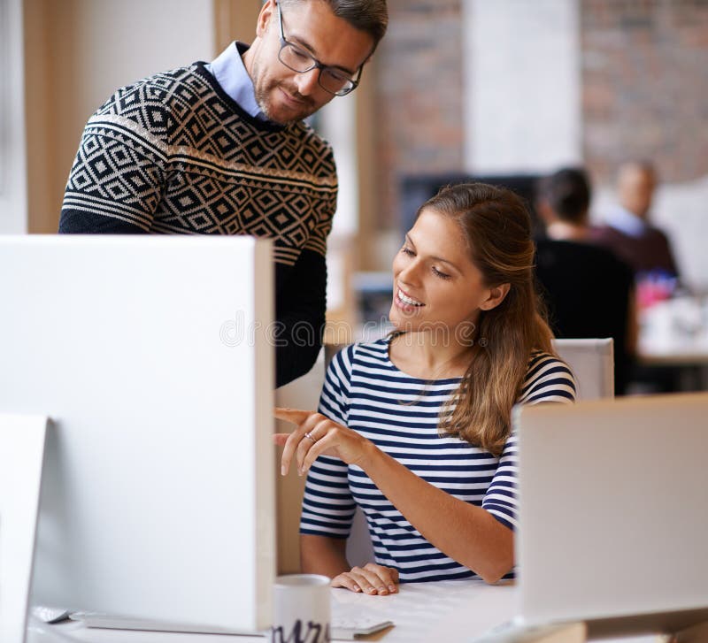 Bouncing Ideas Off of Each Other. Two Designers Working Together at a ...