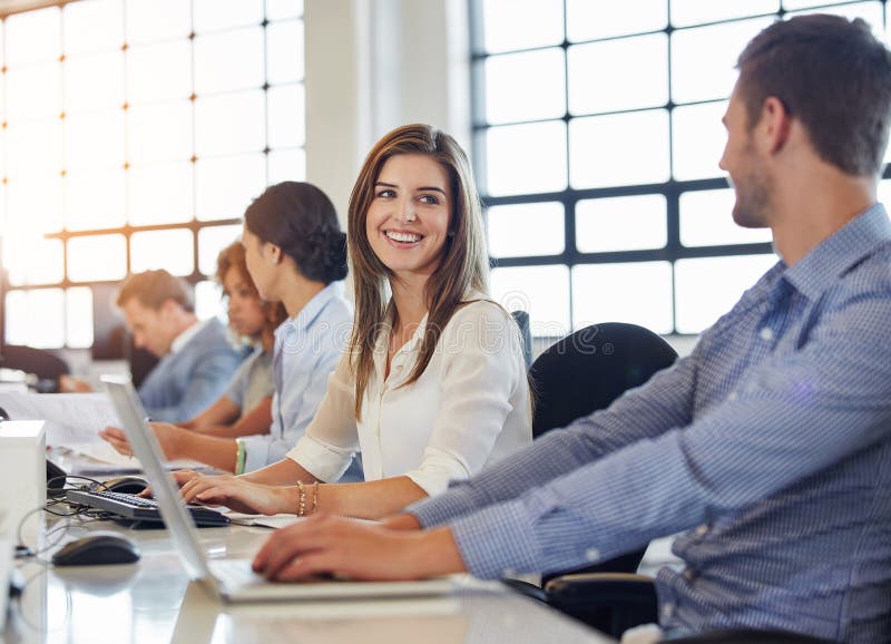 Bouncing Ideas Off of One Another. a Group of Businesspeople Working in ...