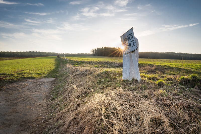 Boundary Stone at the National Border with Sun Star Stock Photo - Image ...