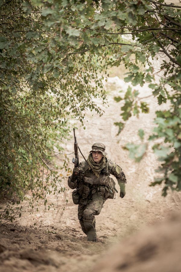 Heavy Armed Soldier stock image. Image of male, combat - 25024499