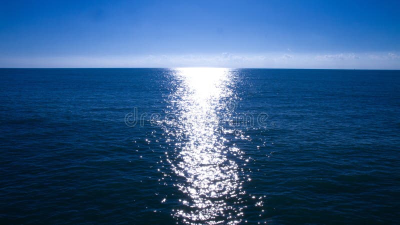 The Boundless Blue Sea, Over Which the Sun Shines Brightly, Leaving a ...