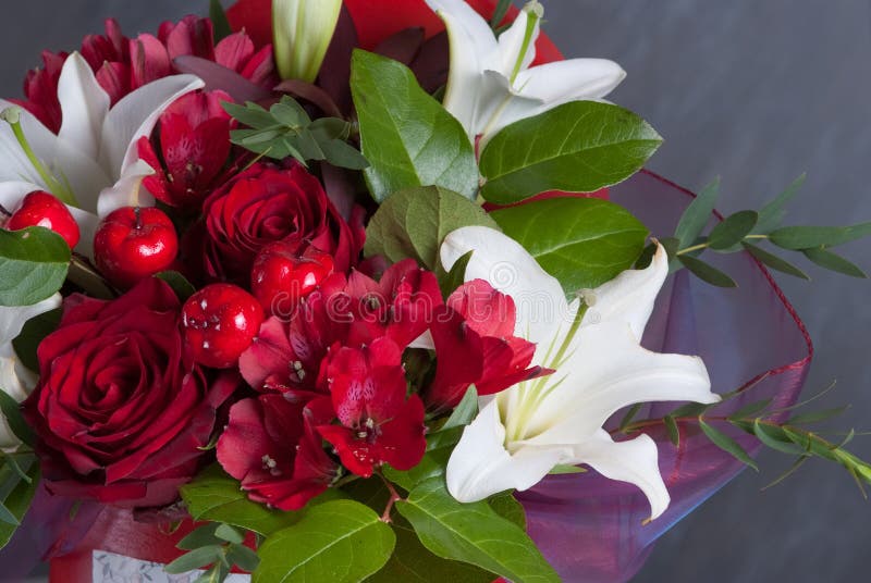 Bouqet of Lilac Flowers with Red Roses and White Flowers. Selective ...