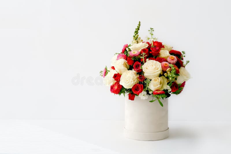 Bouquet of Beautiful Flowers Decorated in Round Box on Light Background ...