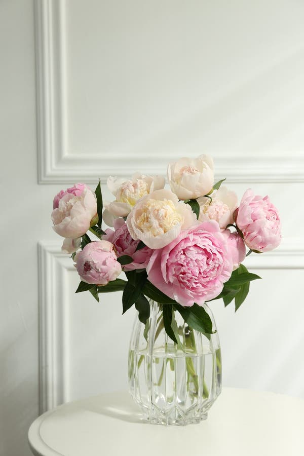 Bouquet of Peonies in Glass Vase on White Table Stock Photo - Image of ...