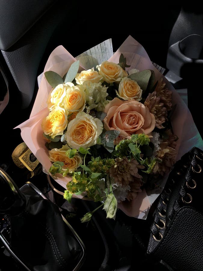 A Bouquet of Beautiful Spring Flowers in the Car Best Gift Stock Photo ...
