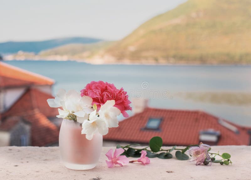 Bouquet of Flowers on the Background of Mountains and Sea Stock Image ...