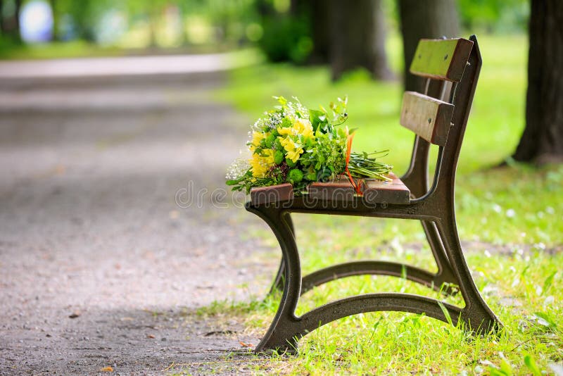 Bouquet of Flowers on a Bench in the Park Stock Image - Image of nature ...