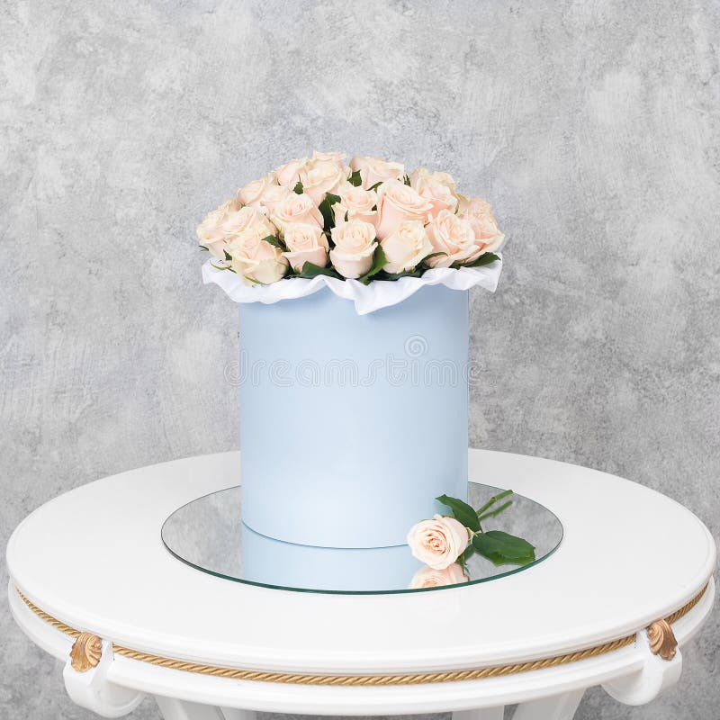 Bouquet of Flowers in a Hat Box on the Table Stock Photo - Image of ...