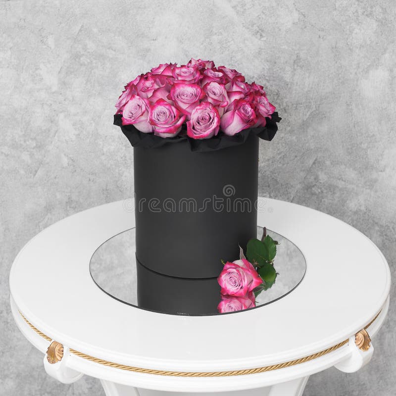 Bouquet of Flowers in a Hat Box on the Table Stock Photo - Image of ...