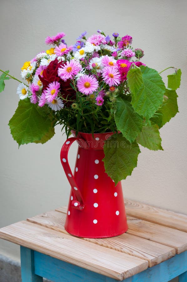 Bouquet of Flowers in a Jug. Stock Photo - Image of color, rustic: 27274142