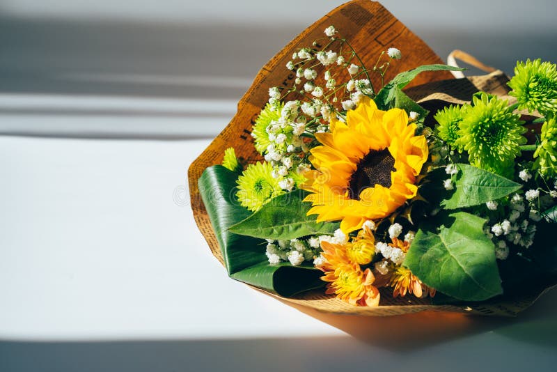 Bouquet of Flowers Wrapped in Paper Stock Image - Image of emotion ...