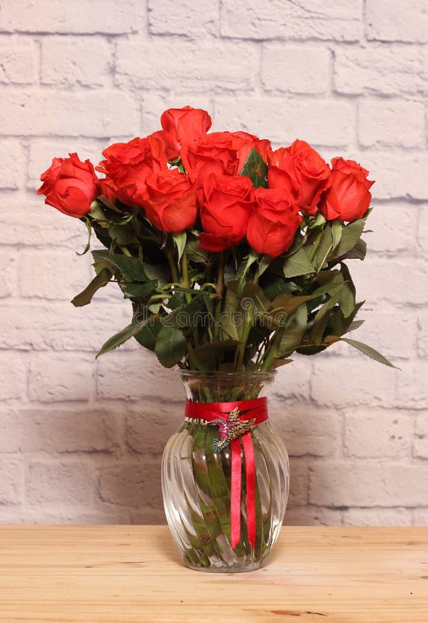 Bouquet of Long Stem Roses in Glass Vase Stock Photo - Image of petal ...