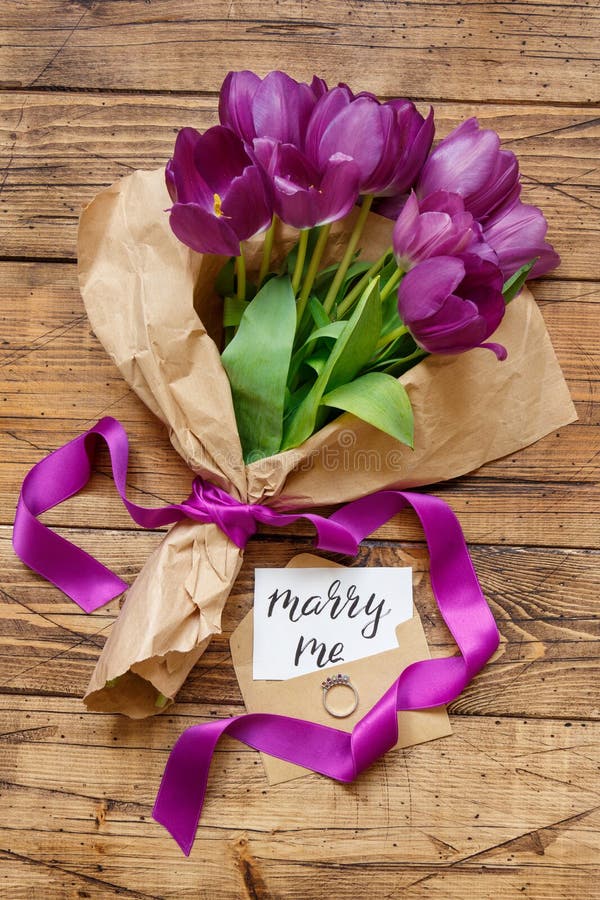Bouquet and MARRY ME Card on Wooden Table Stock Photo - Image of ...
