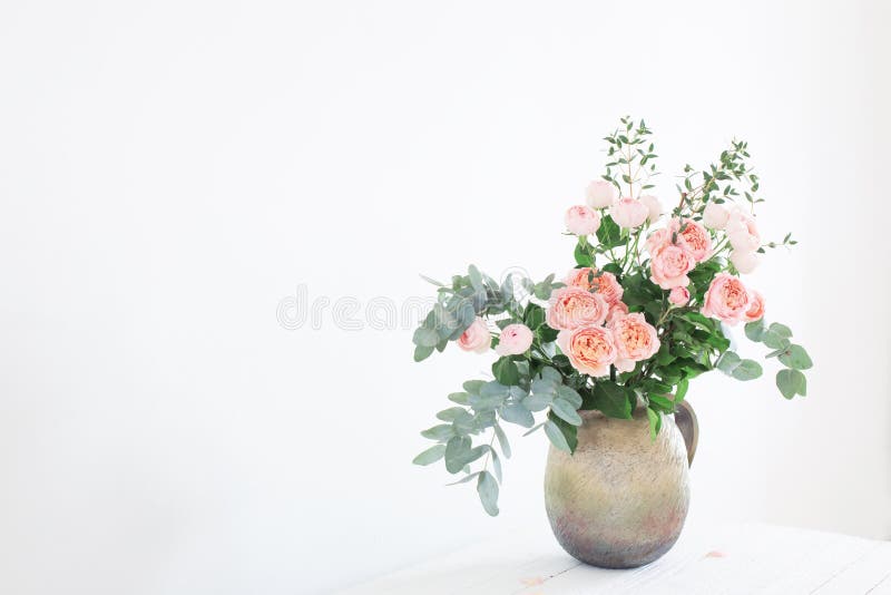 Bouquet of Roses in Ceramic Jug on White Background Stock Image - Image ...