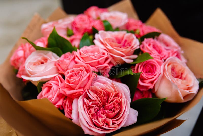 Bouquet of Pink Roses in a Craft Paper Wrap Stock Image - Image of ...