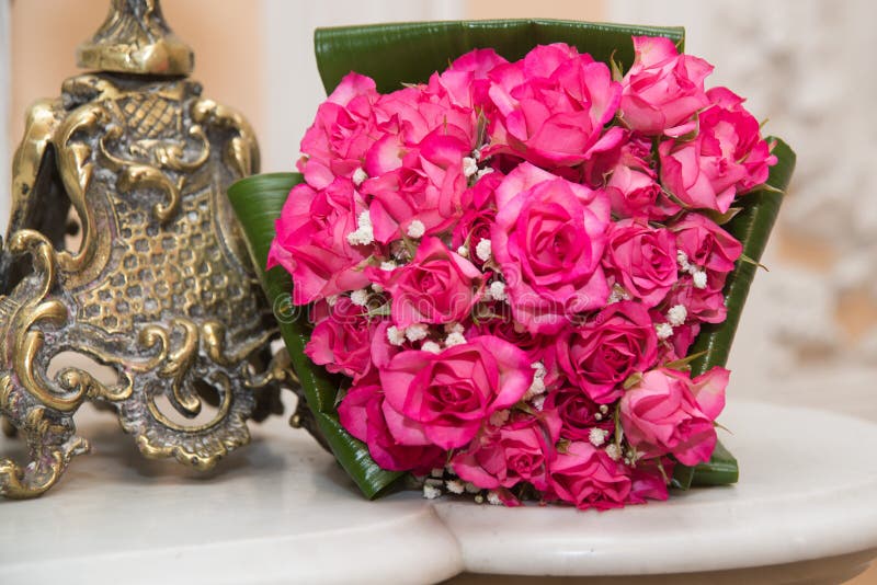 A Bouquet of Red Roses Lying on the Table Stock Image - Image of ...