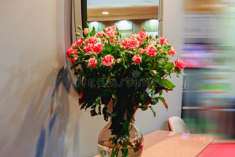 Bouquet of Red Roses on a Shelf by the Mirror Stock Image - Image of ...
