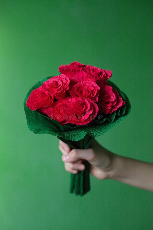 A Bouquet of Roses in Hand, Made by Hand from Paper. Stock Photo ...