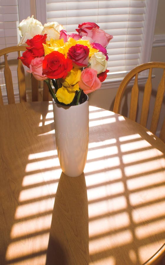 Bouquet of roses on table stock image. Image of colourful - 3661305