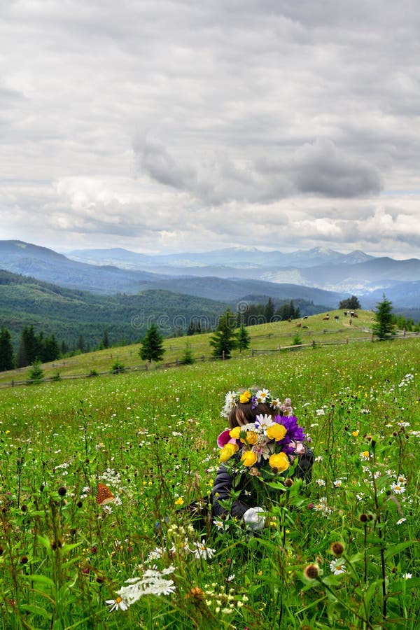 Bouquet of Wildflowers in the Hands of a Girl on a Glade in the ... Bouquet of Wildflowers in the Hands of a Girl on a Glade in the ...