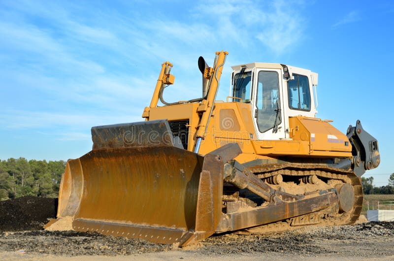 Bouteur photo stock. Image du excavatrice, construction - 64327550